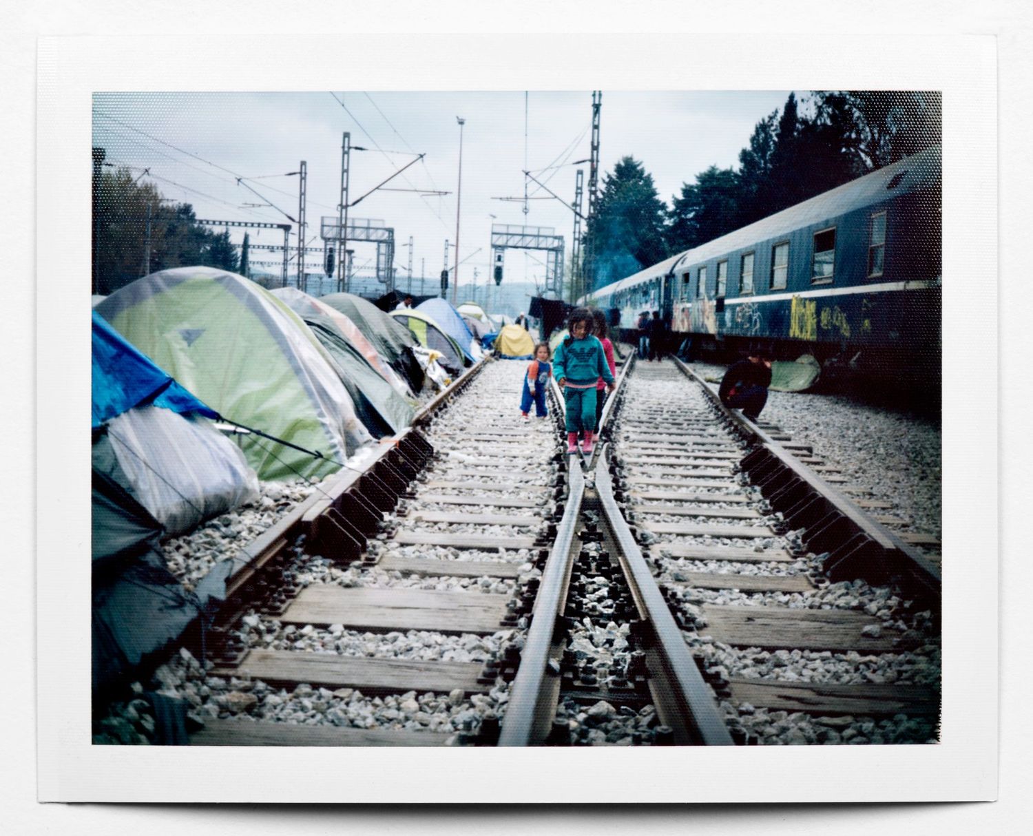 A Polaroid for a Refugee - Photographs and text by Giovanna del Sarto ...